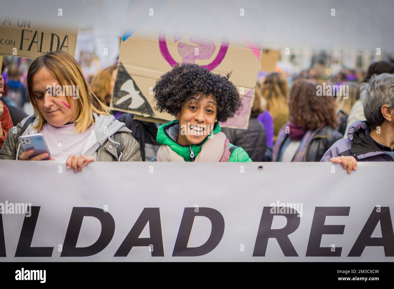 smiling afrodescendant woman marching in 8M Madrid Spain Stock Photo ...