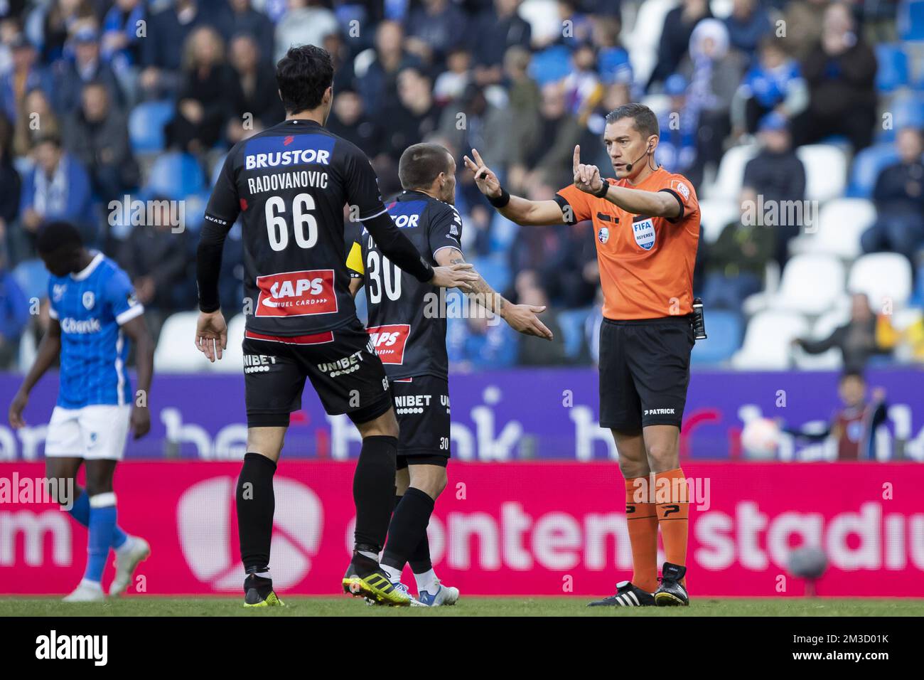 Kortrijk's Kristof D'Haene and referee Jonathan Lardot pictured during a soccer match between ...