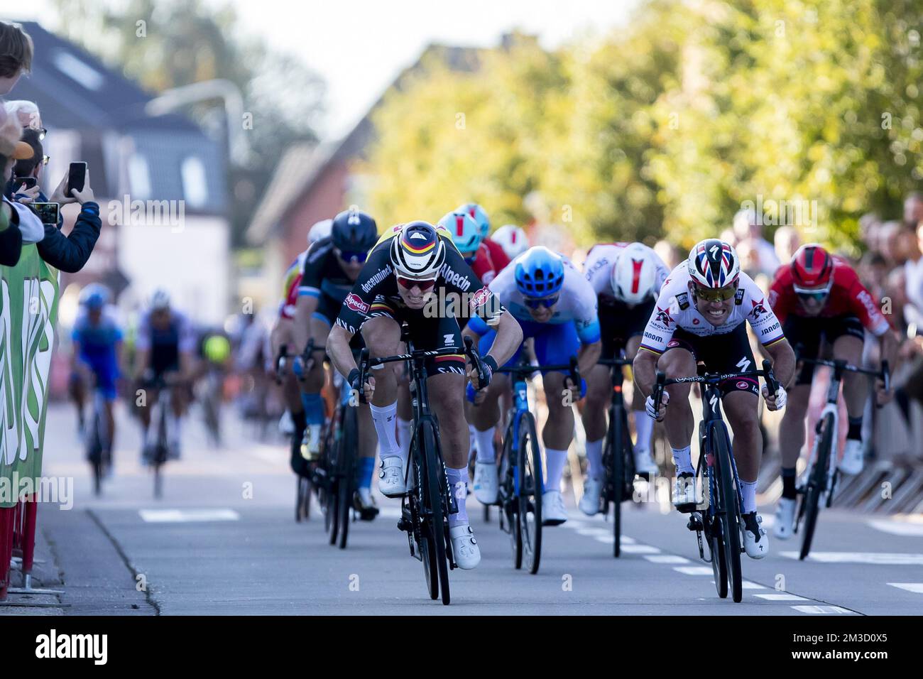 Tim Merlier and Mark Cavendish sprint for the finish during the ...