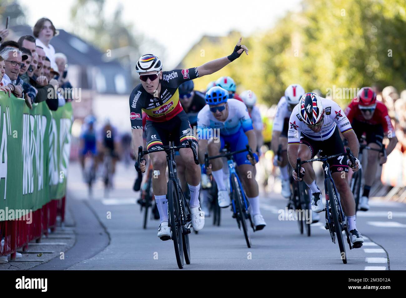 Belgian Tim Merlier of Alpecin-Deceuninck celebrates on the finish line ...