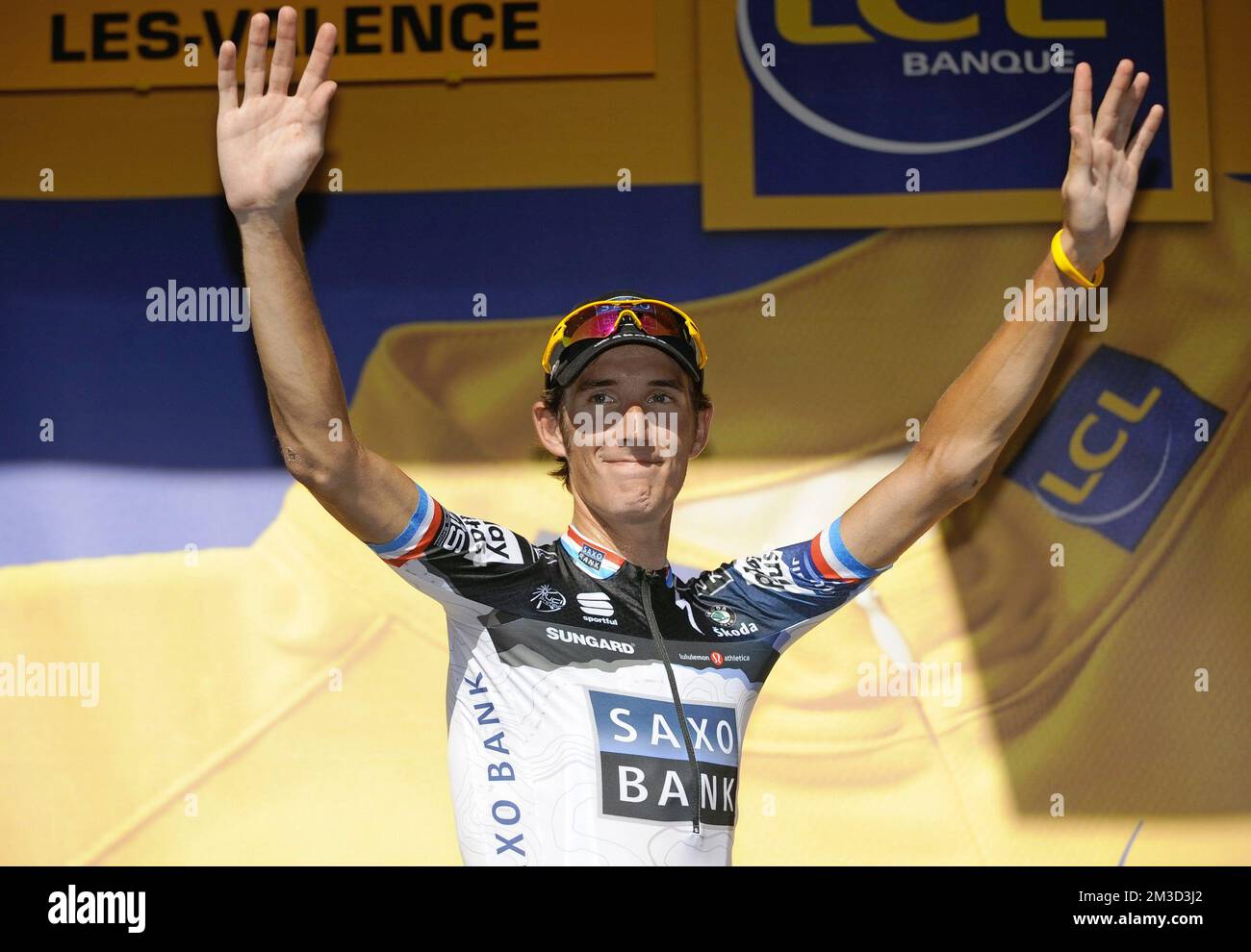 Luxemburg's Andy Schleck of team Saxo Bank celebrates on the podium ...