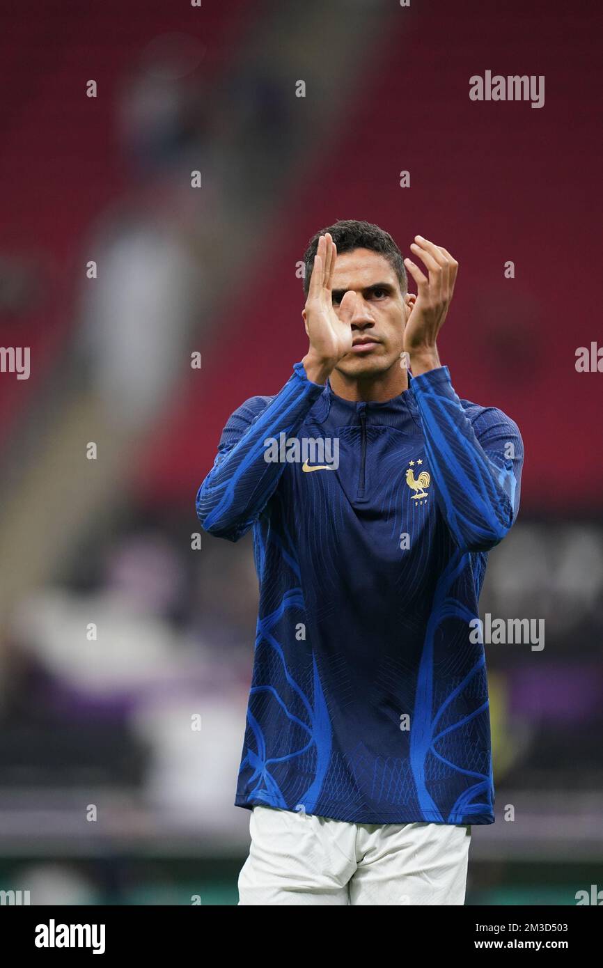 DOHA, QATAR - DECEMBER 14: Player of France Raphaël Varane warms up ...