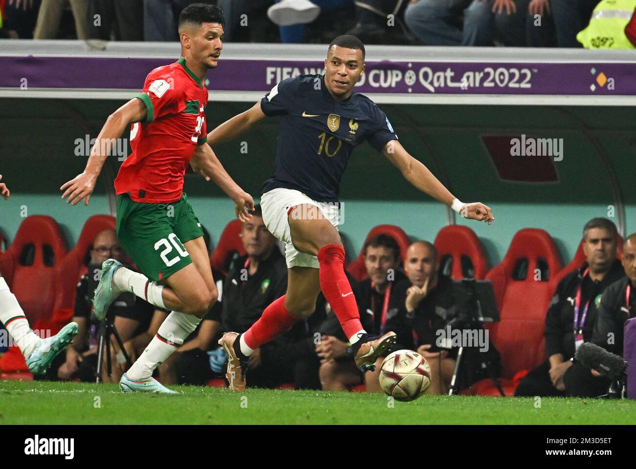 Al Khor, Qatar. 14th Dec, 2022. Kylian Mbappe of France and Achraf Dari ...