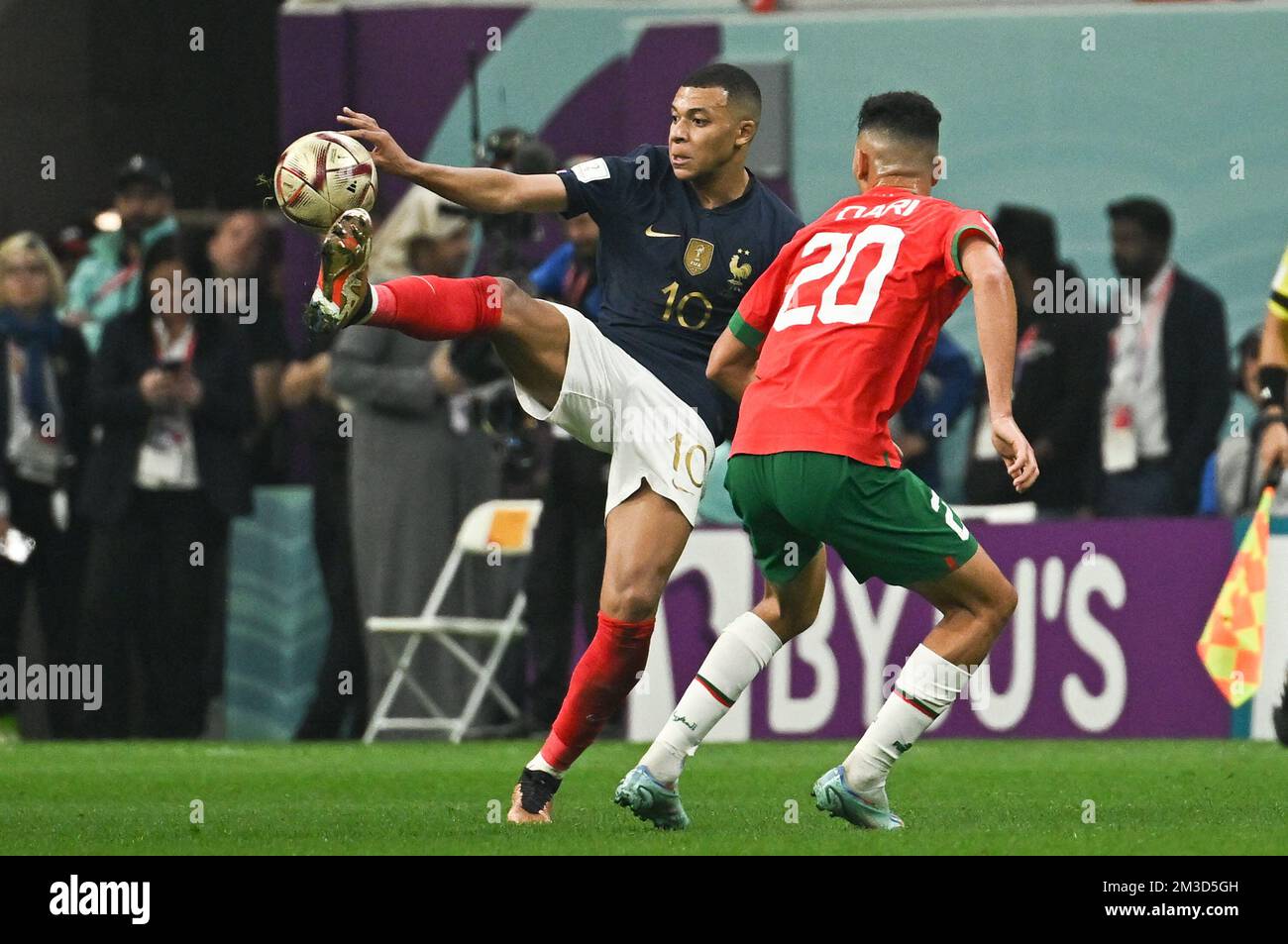 Al Khor, Qatar. 14th Dec, 2022. Kylian Mbappe of France and Walid ...