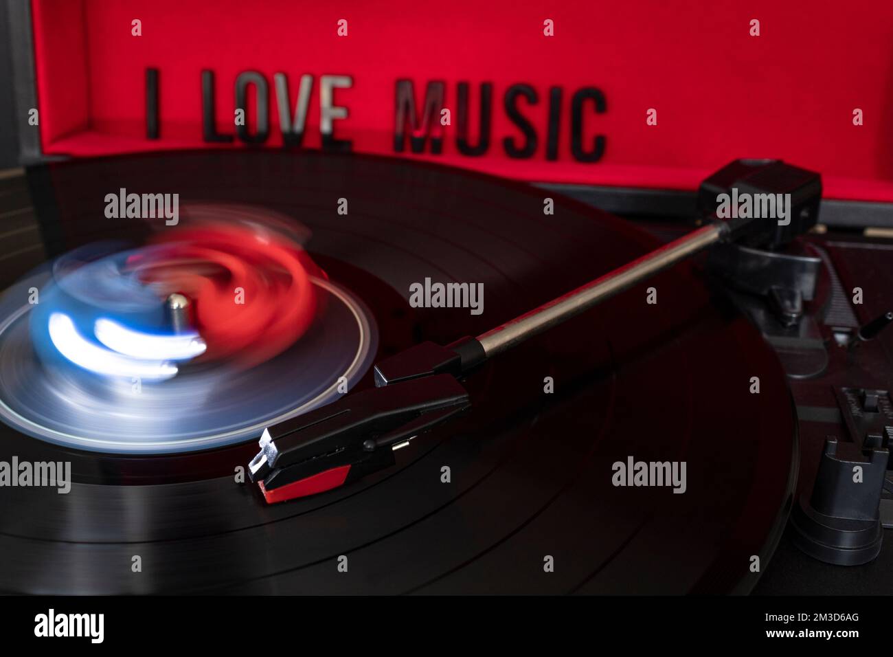 close up to a turn table needle playing a LP vinyl disc with turn table ...