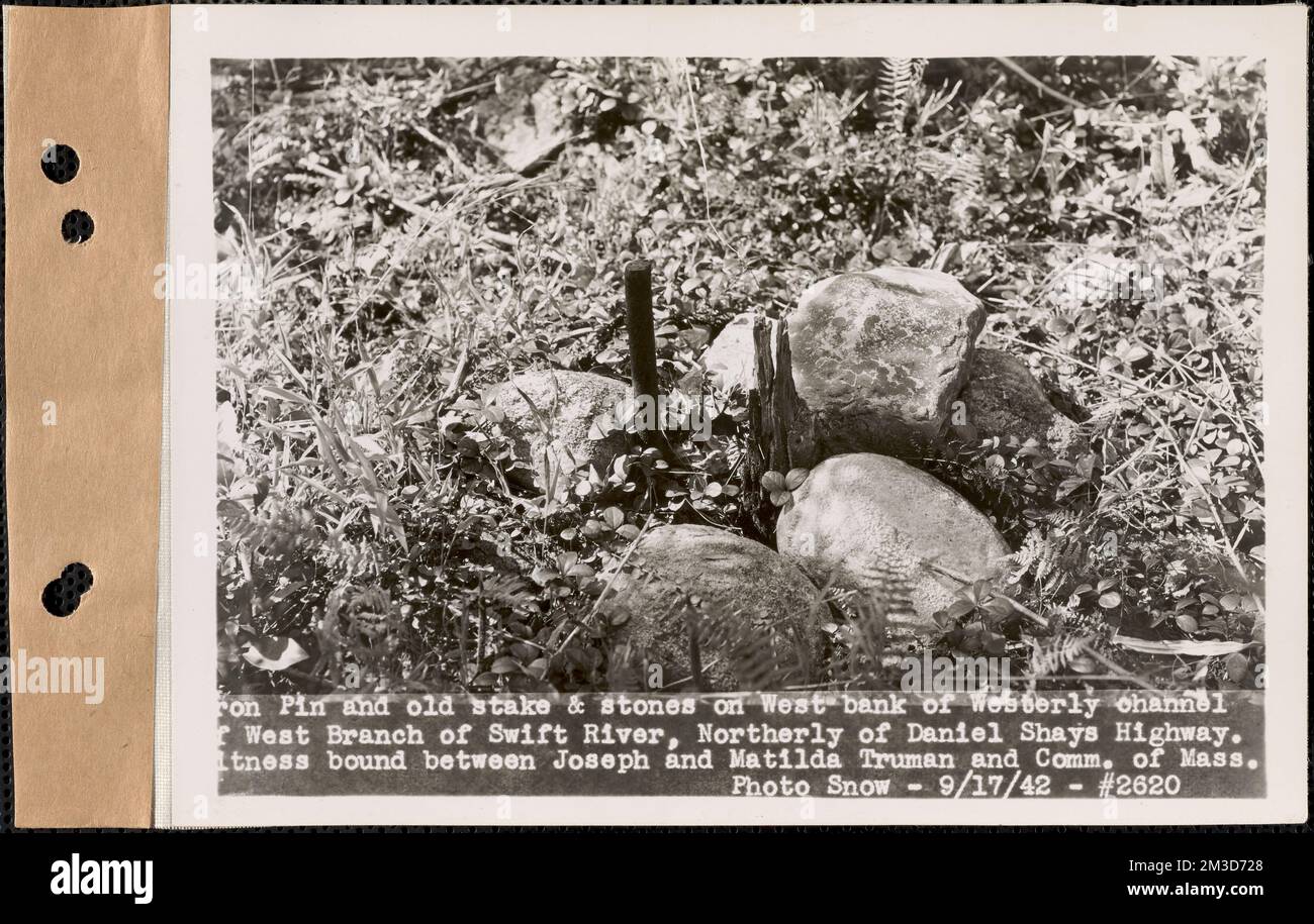 Iron pin and old stake and stones on west bank of westerly channel of ...