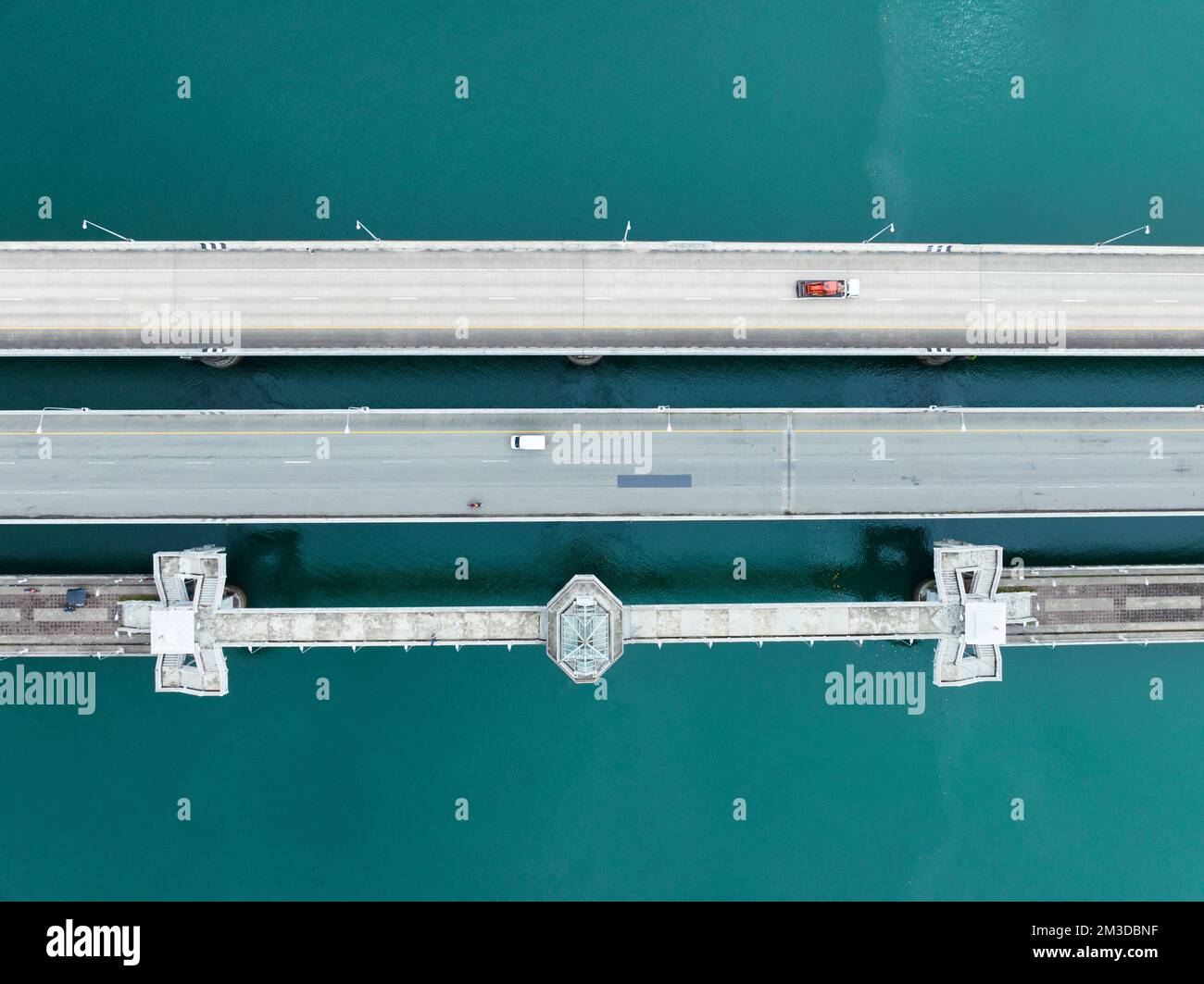 Aerial top view drone shot of bridge with cars on bridge road image ...