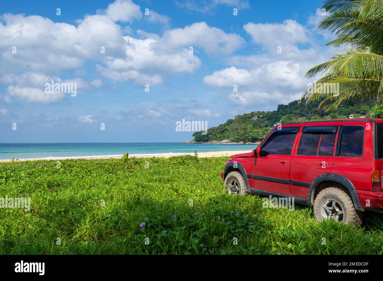 Red 4x4 car on the beach in summer season, Tropical sea view, Beautiful ...