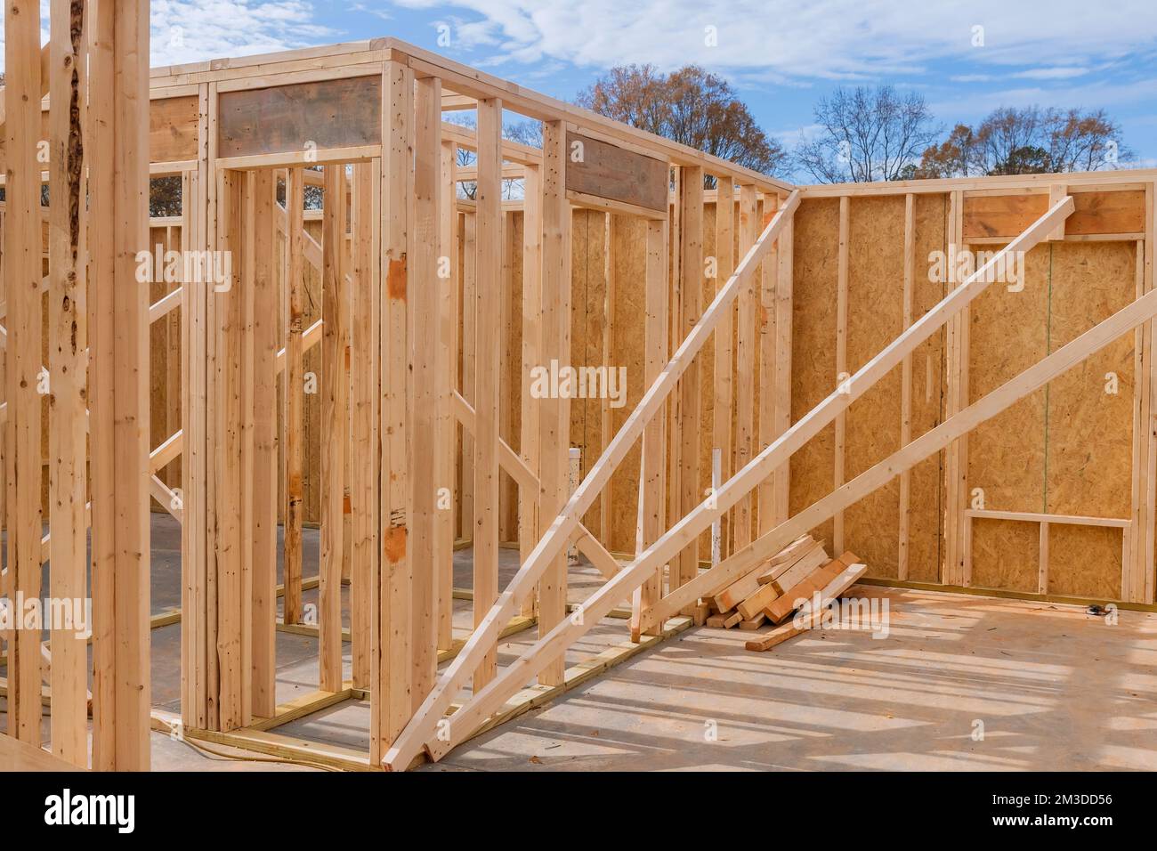 Timber frame house of wooden beam framework on stick built home under ...
