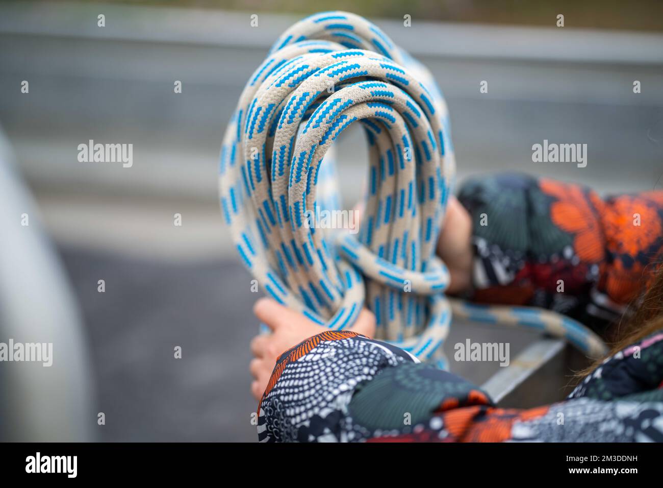 woman worker working with rope and cord on a ute in australia Stock ...