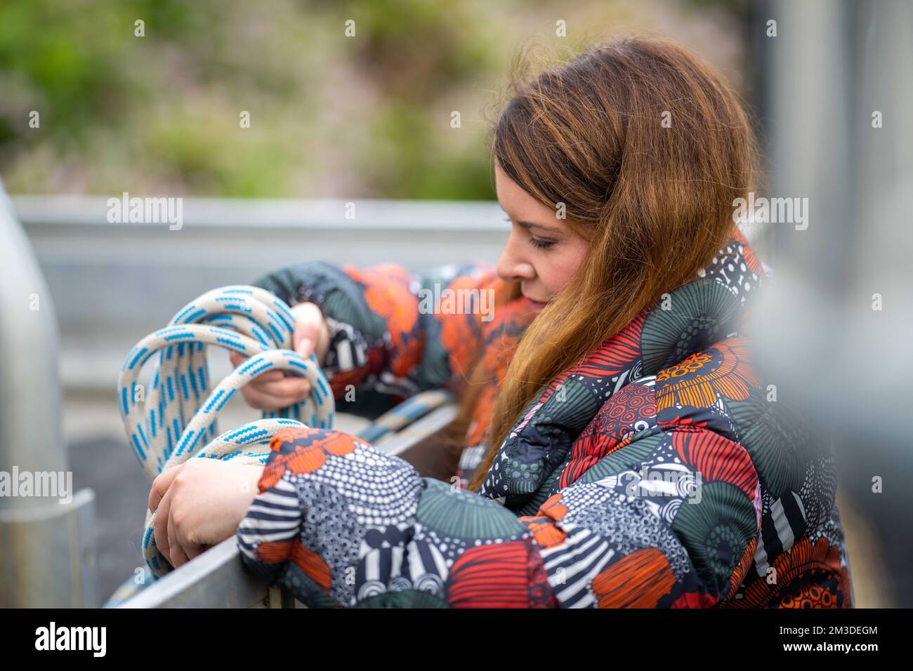 woman worker working with rope and cord on a ute in australia Stock ...