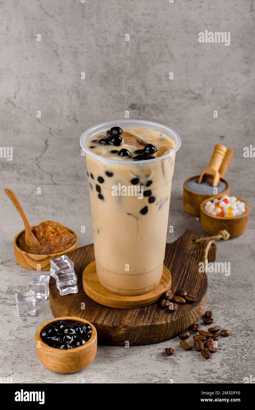 Boba or tapioca pearls is taiwan bubble milk tea in plastic cup with ...