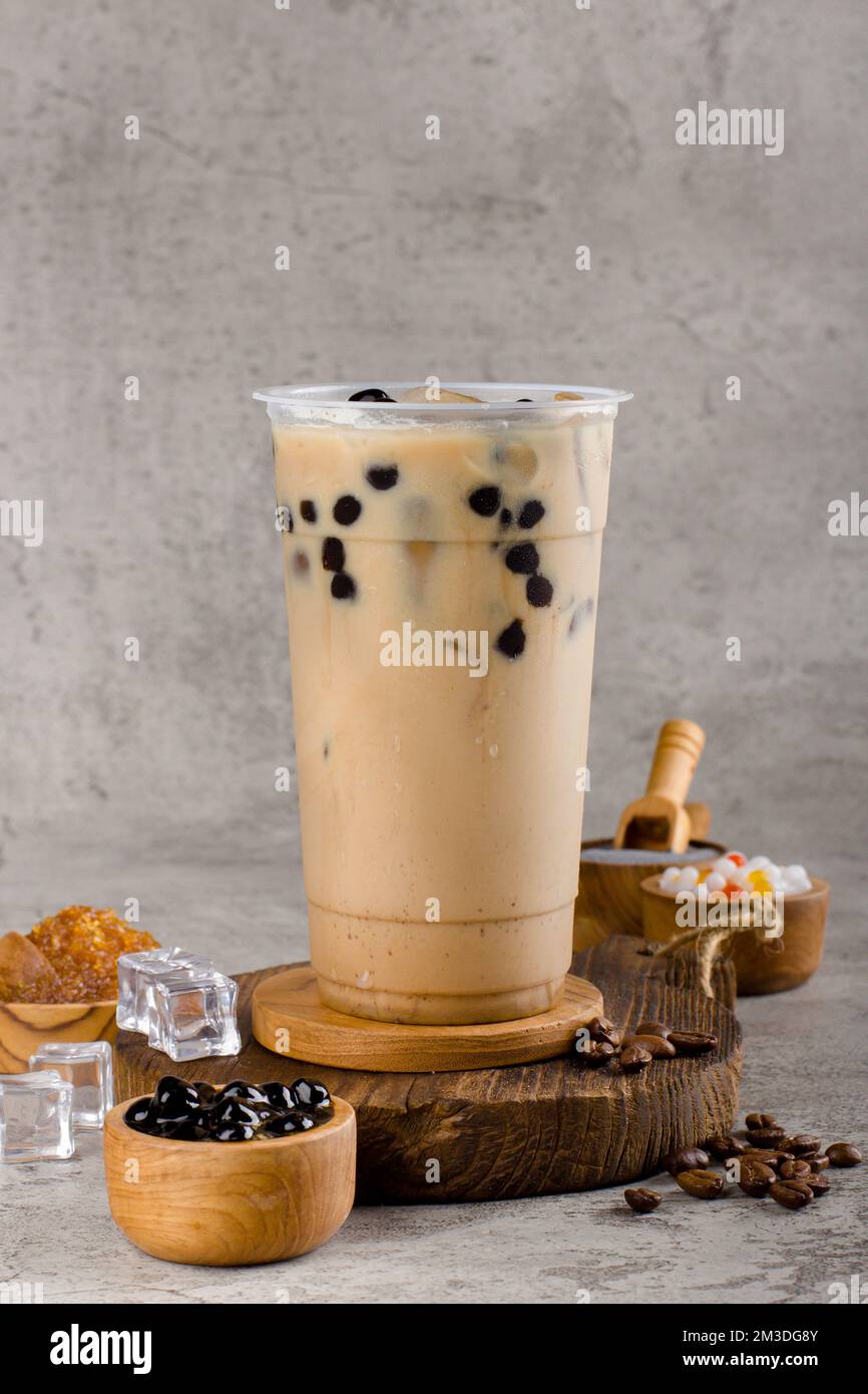 Boba or tapioca pearls is taiwan bubble milk tea in plastic cup with ...
