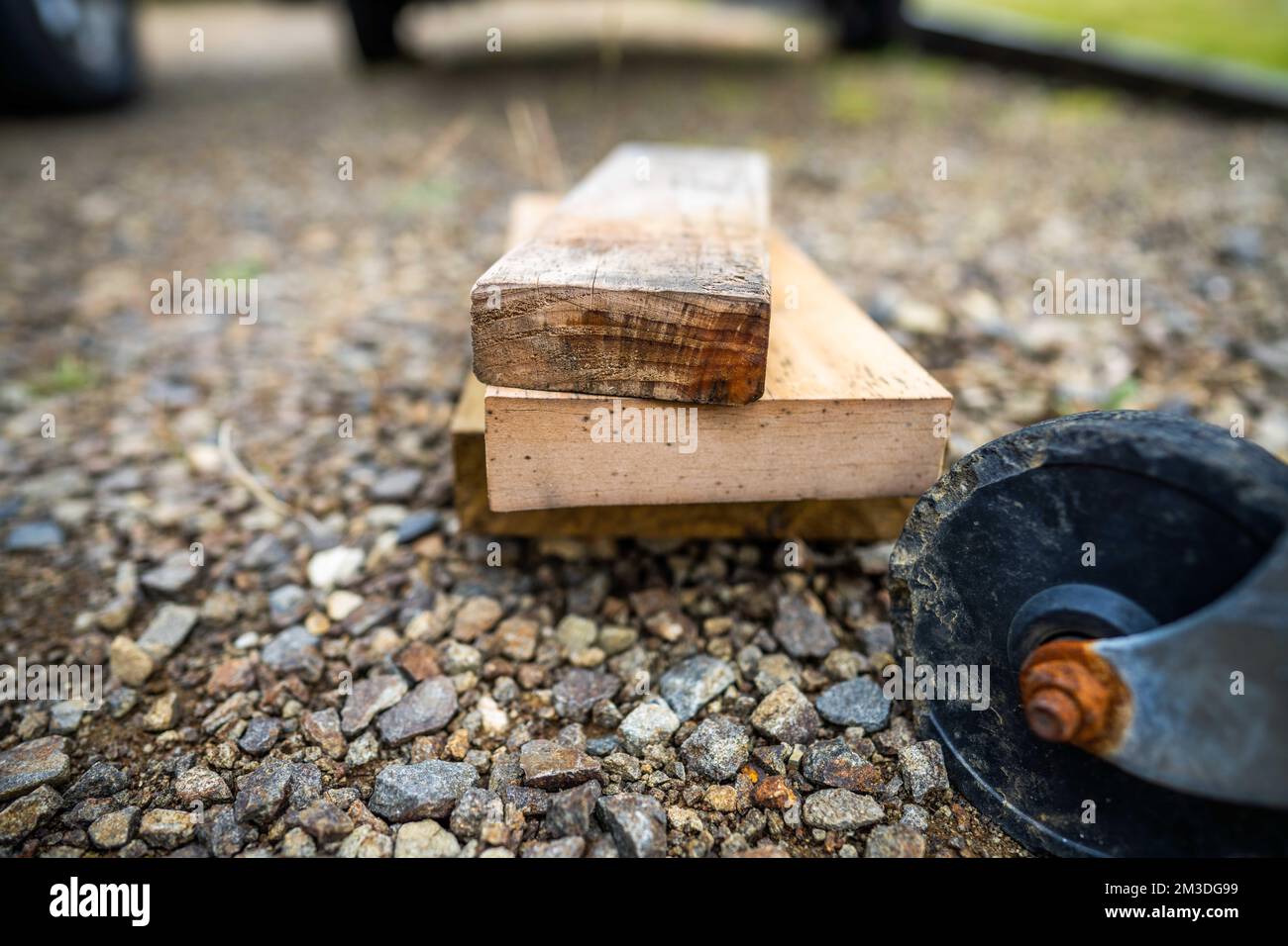 tyre blocks for a trailer in a park for camping Stock Photo - Alamy