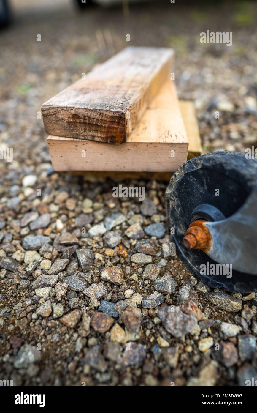 tyre blocks for a trailer in a park for camping Stock Photo - Alamy