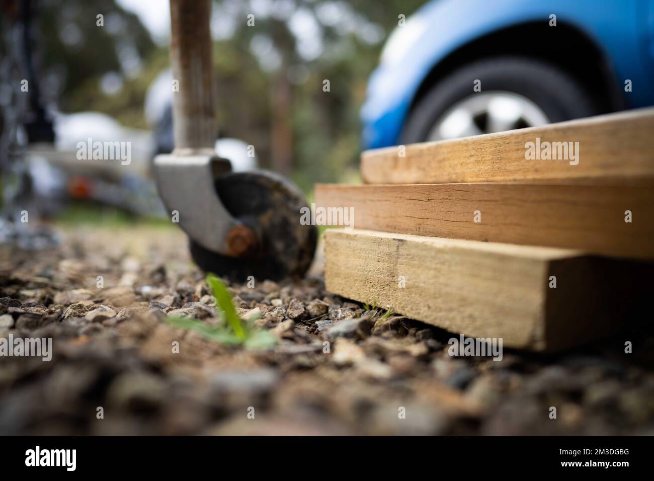 tyre blocks for a trailer in a park for camping Stock Photo - Alamy