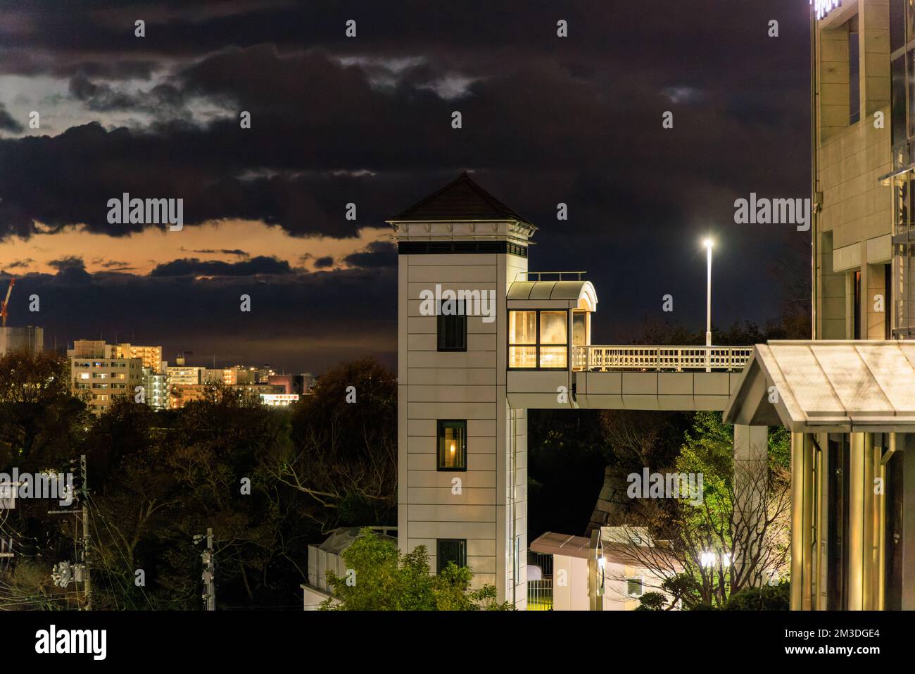 Exterior elevator shaft provides access to public building with ...