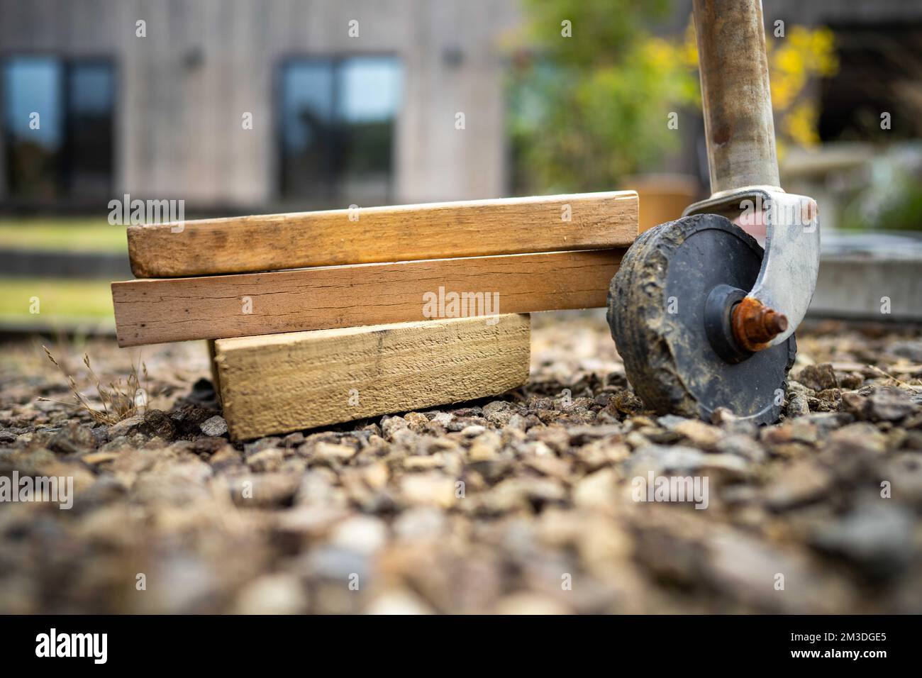 tyre blocks for a trailer in a park for camping Stock Photo - Alamy