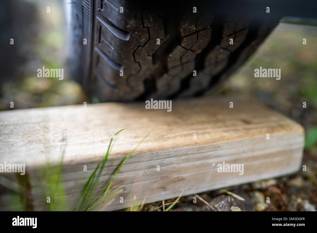wood chocks for a caravan and camping. chocks behind a tyre. camping ...