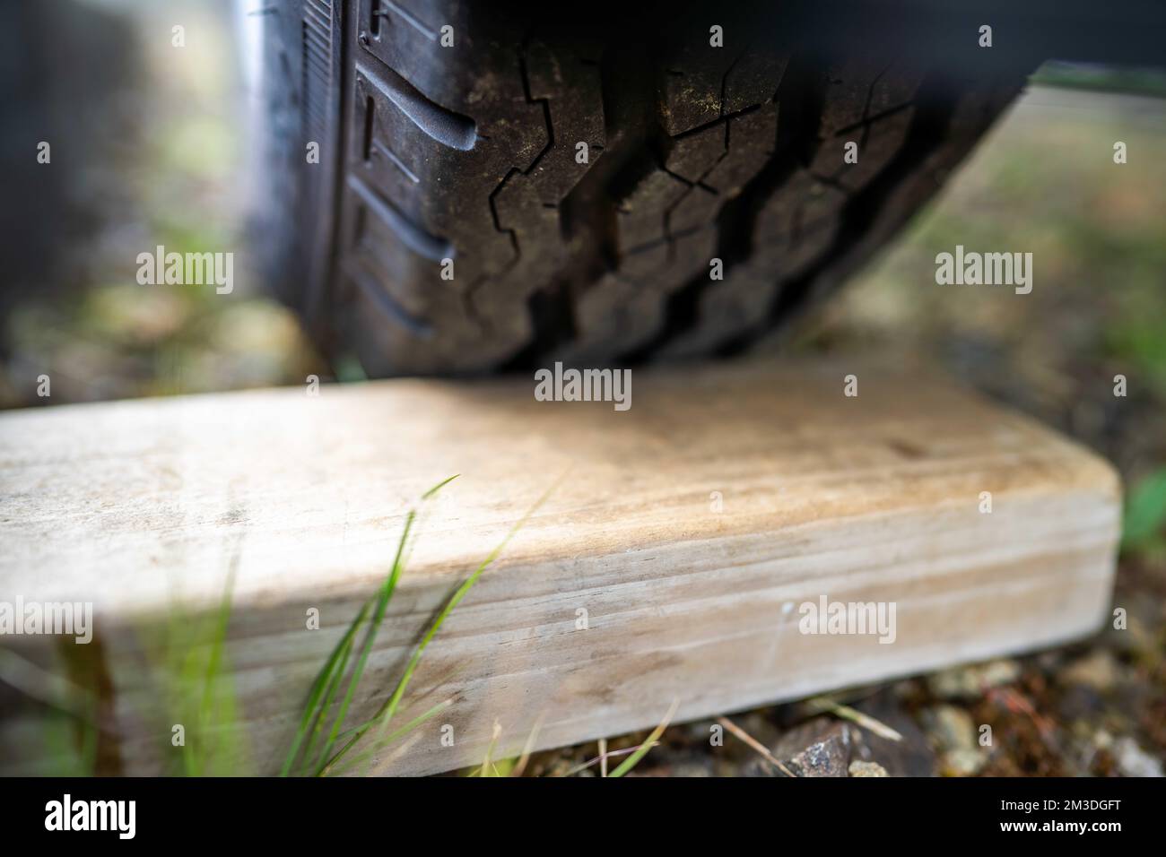 wood chocks for a caravan and camping. chocks behind a tyre. camping ...