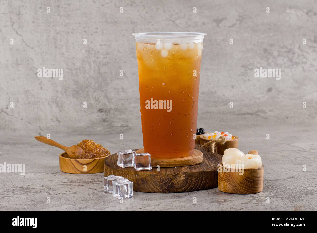 Boba or tapioca pearls is taiwan bubble milk tea in plastic cup with ...