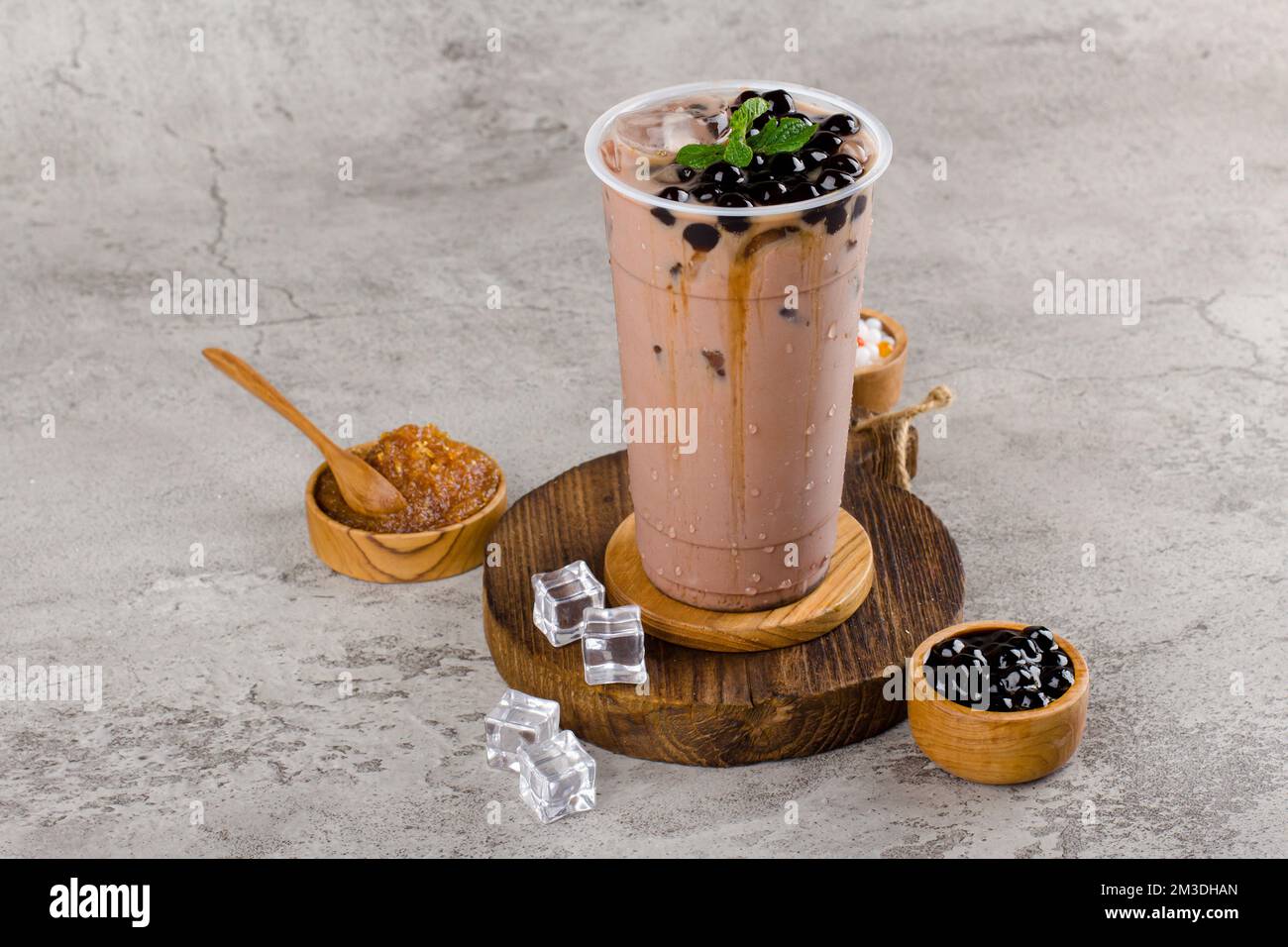 Boba or tapioca pearls is taiwan bubble milk tea in plastic cup with ...