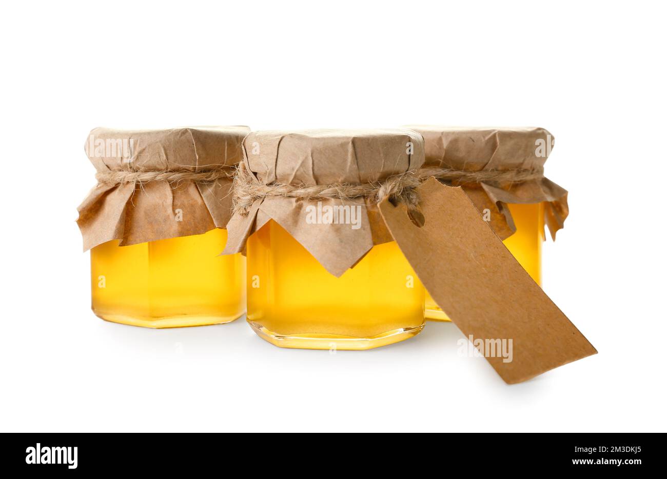 Honey bonbonnieres with tag on white background Stock Photo - Alamy