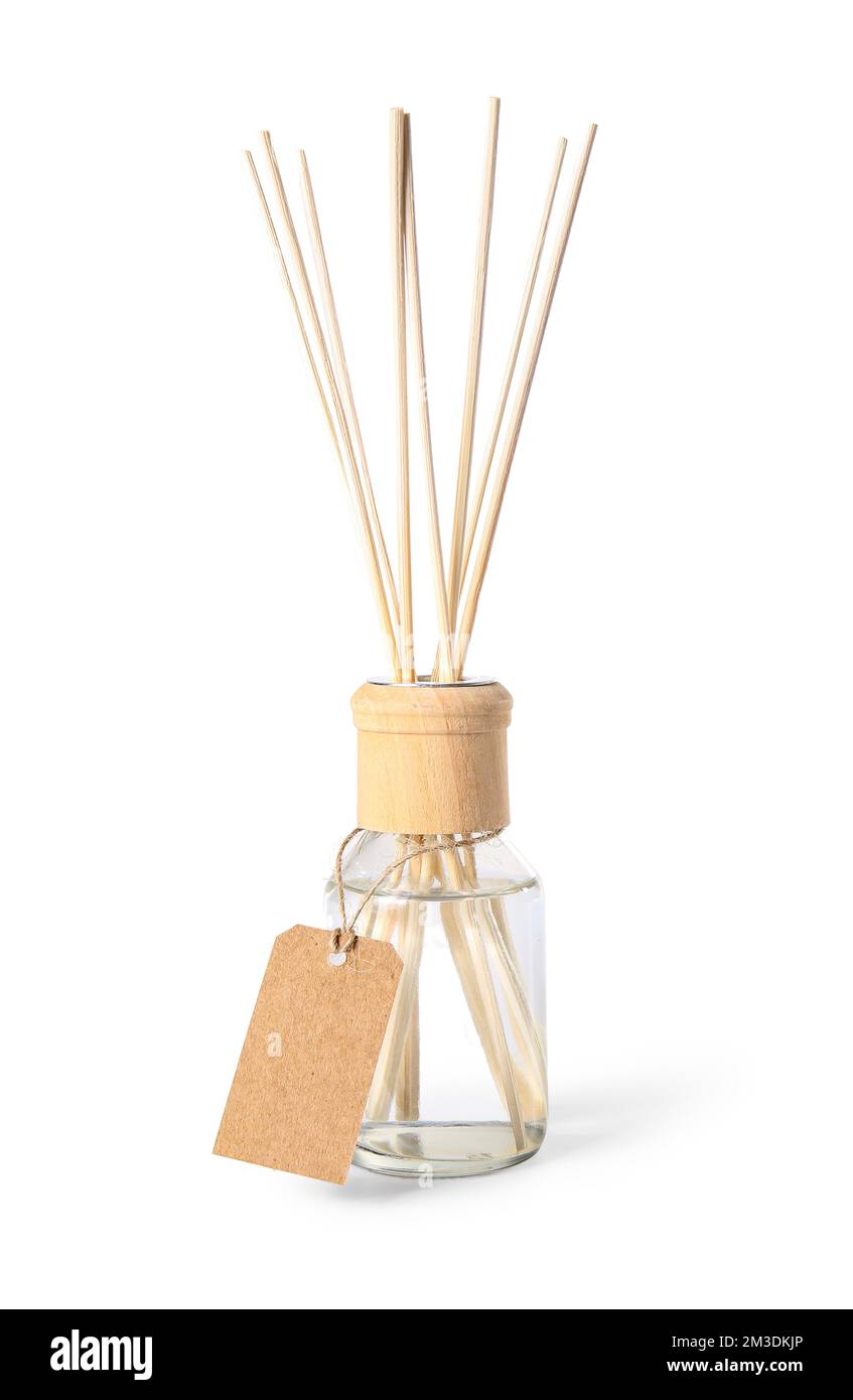 Reed diffuser with blank tag on white background Stock Photo - Alamy