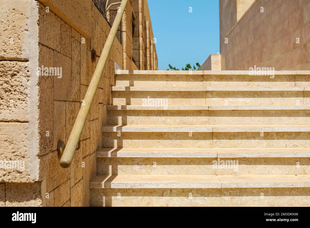 View of stone steps with railing in city Stock Photo - Alamy