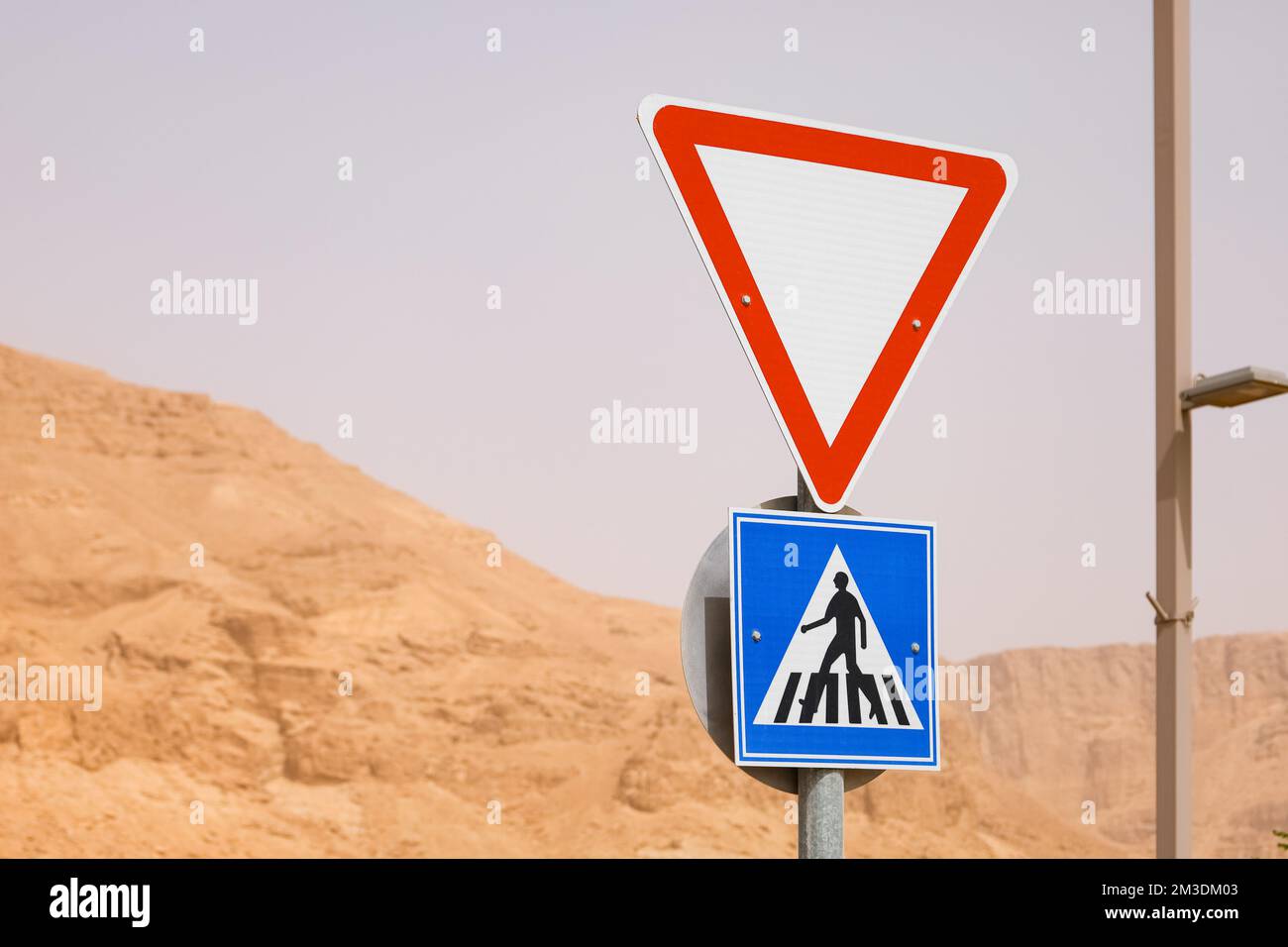 Different traffic signs in desert Stock Photo - Alamy