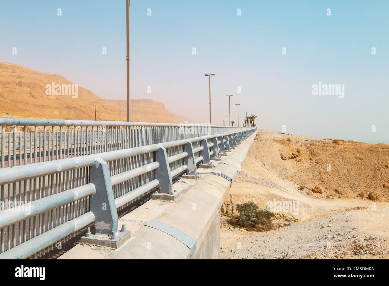 View of road bridge in desert Stock Photo - Alamy