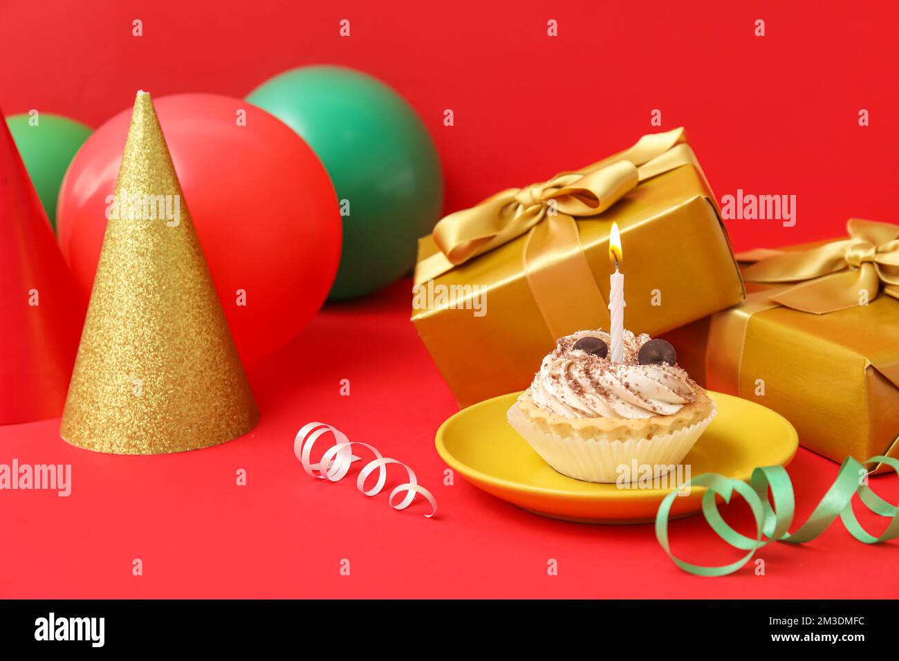 Birthday cake, party hat, gifts and balloons on red background Stock ...