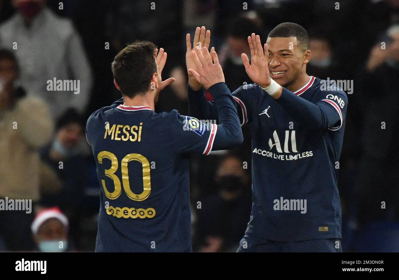 File photo - Kylian Mbappe of PSG celebrates scoring with teammate ...