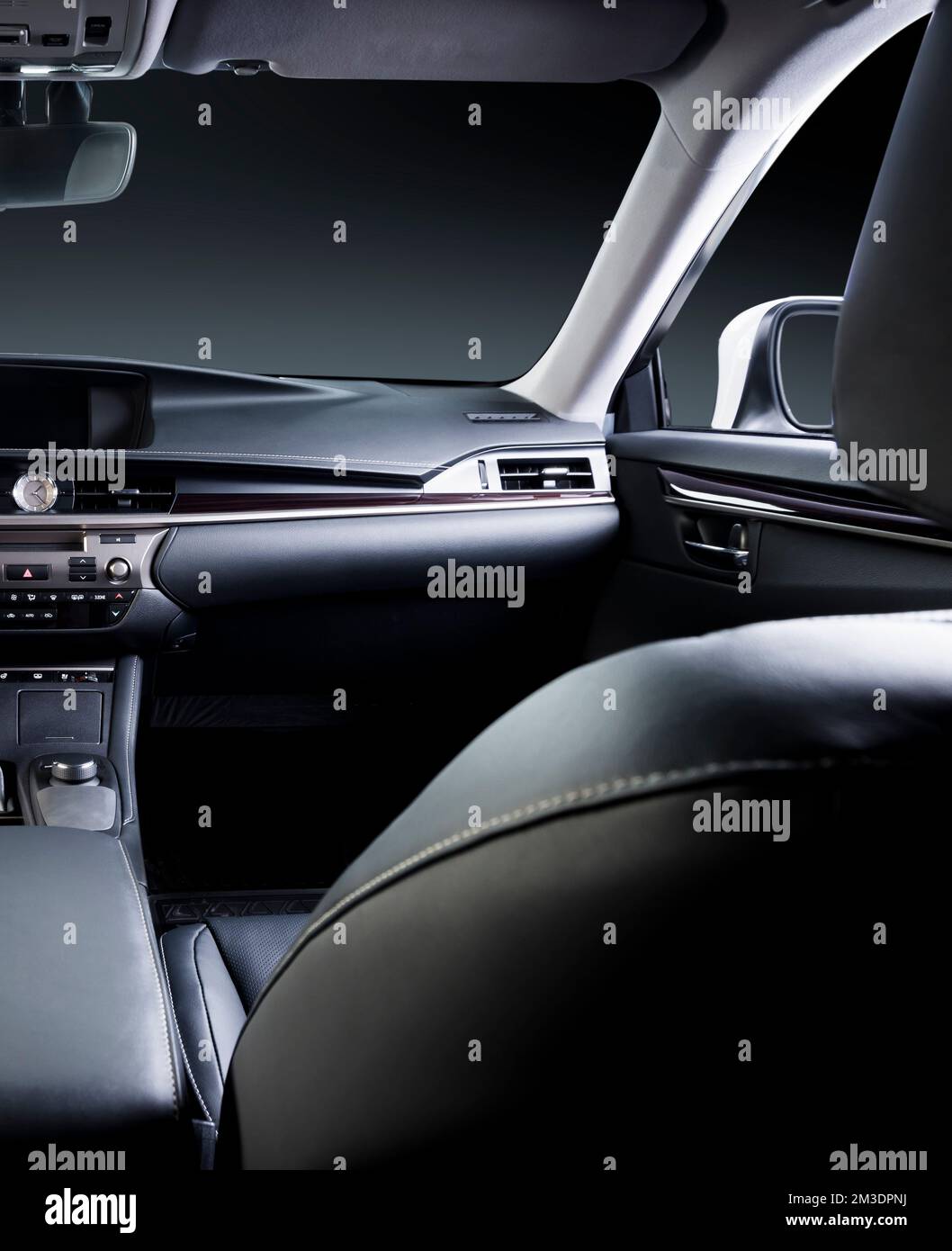 Dark luxury car Interior - steering wheel, shift lever and dashboard ...