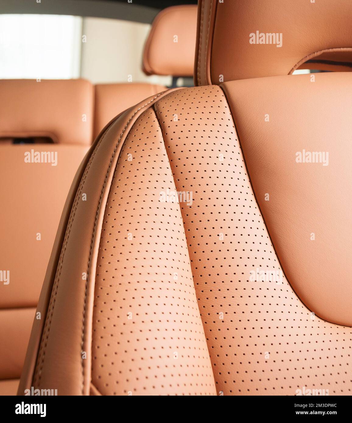Modern sport car perforated red leather interior Stock Photo - Alamy