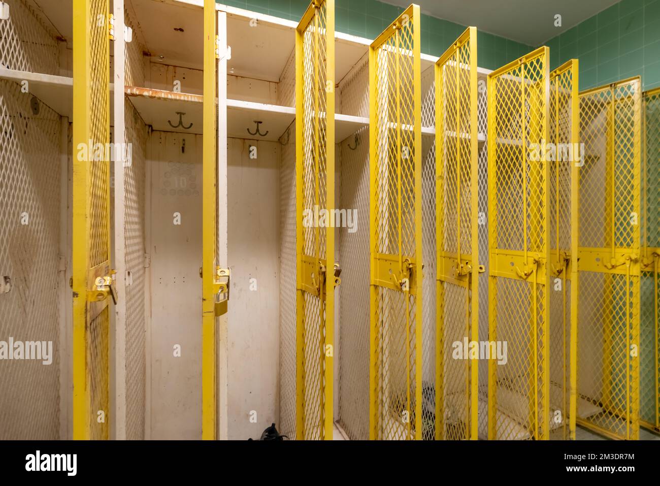Old Yellow Metal Gym Gymnasium Lockers With An Old Locker Room Stock