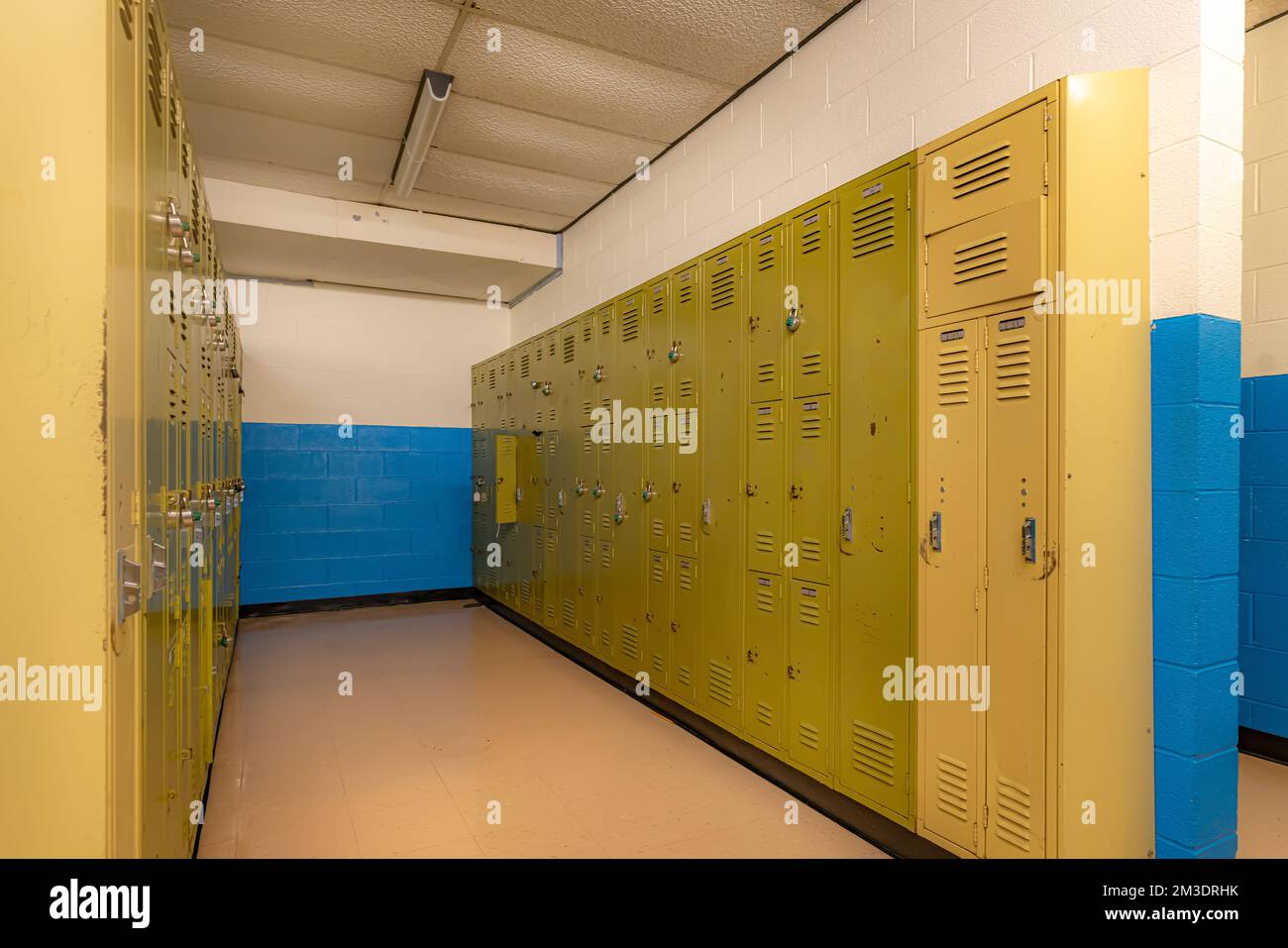 Nondescript Locker Room With Old Yellow And Green Metal Gym Gymnasium