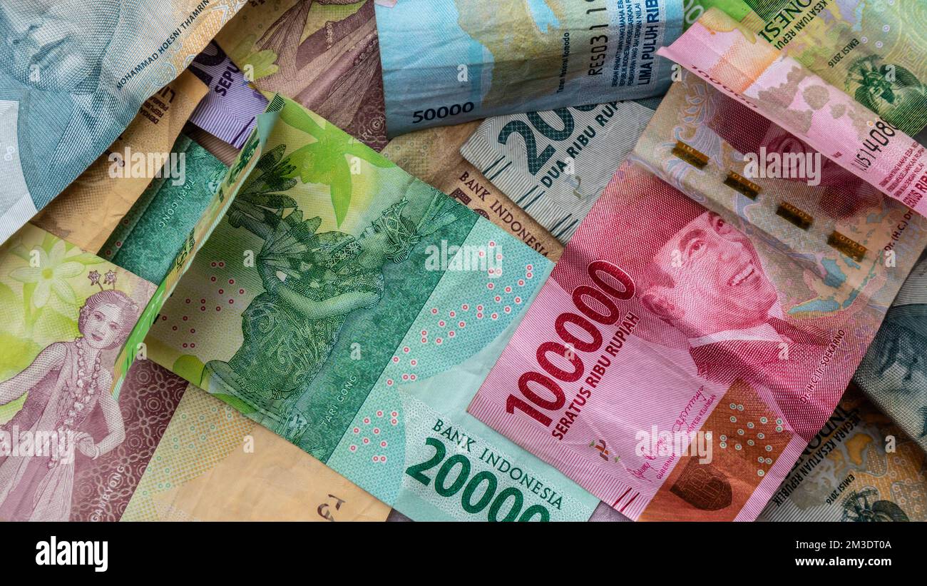 pile of rupiah banknotes as background Stock Photo - Alamy