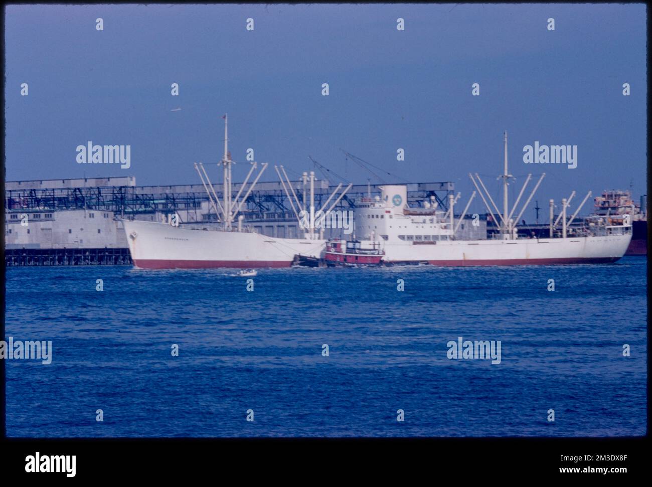 Large white ship and tugboat in Boston Harbor , Ships, Tugboats. Edmund ...