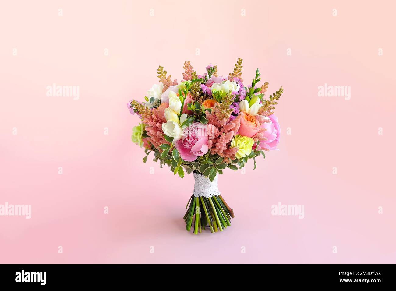 Wedding bouquet with peonies, astilbe, freesia, peony roses Juliet ...