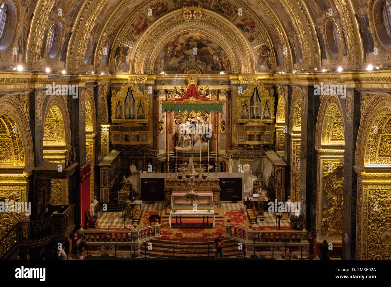 The ornate nave and main altar of St. John Co-Cathedral - Valletta ...