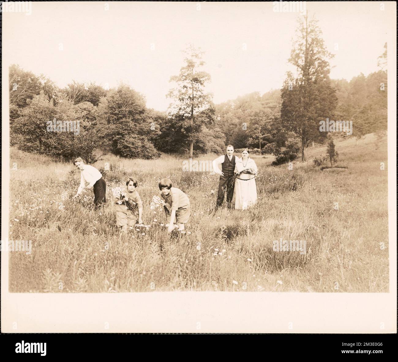 Leon and Alma Abdalian standing while Herman, Lillian, and Marian ...