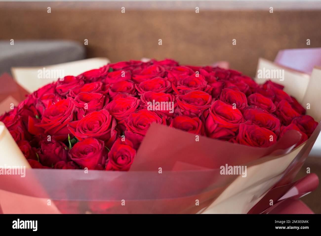 Natural red roses background. Red rose bouquet in the interior of the ...