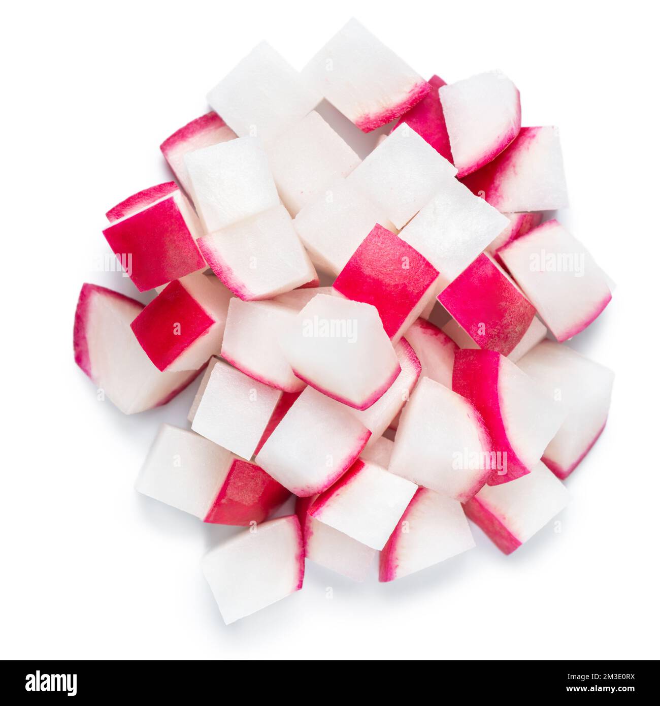 top view of pile vegetables roots of radish diced isolated on white ...