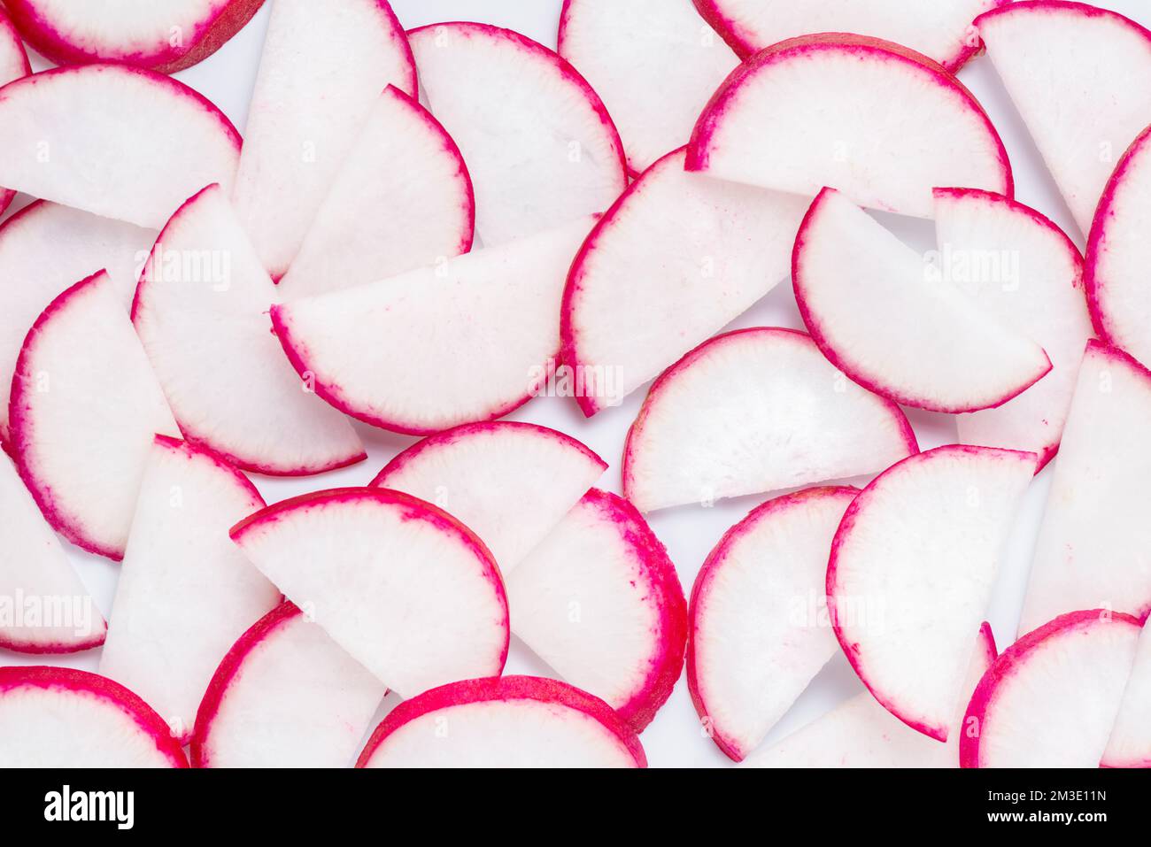 vegetables roots of radish sliced into half rings like background Stock ...