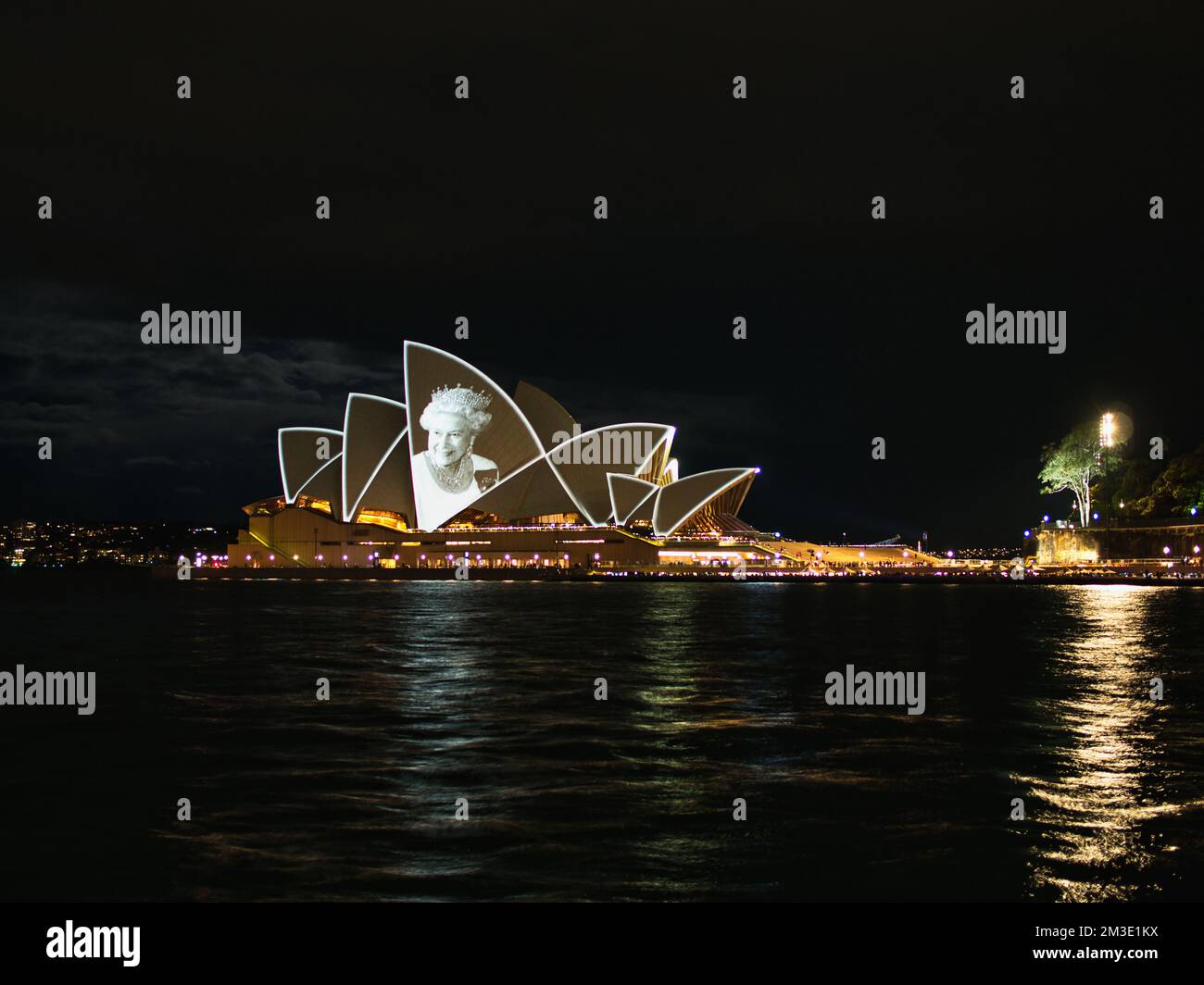 An image of Her Majesty lit up the sails of the Opera House in Sydney ...