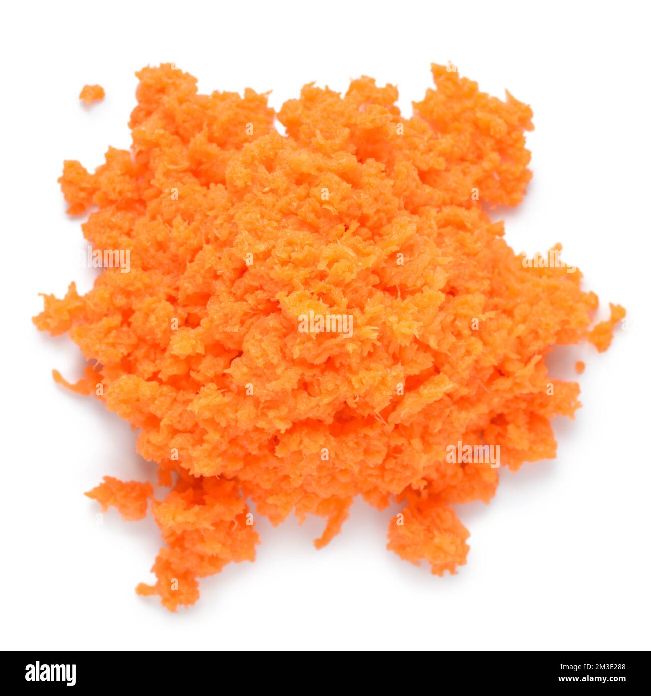 top view of crushed, grated and minced fresh vegetables roots of carrot ...