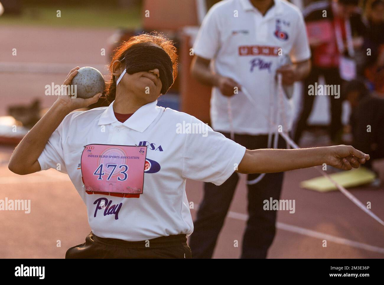 New Delhi, India. 14th Dec, 2022. A visually impaired athlete throws a ...