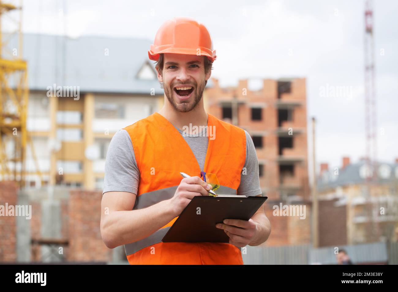 Portrait of construction builder. Construction worker man in work ...