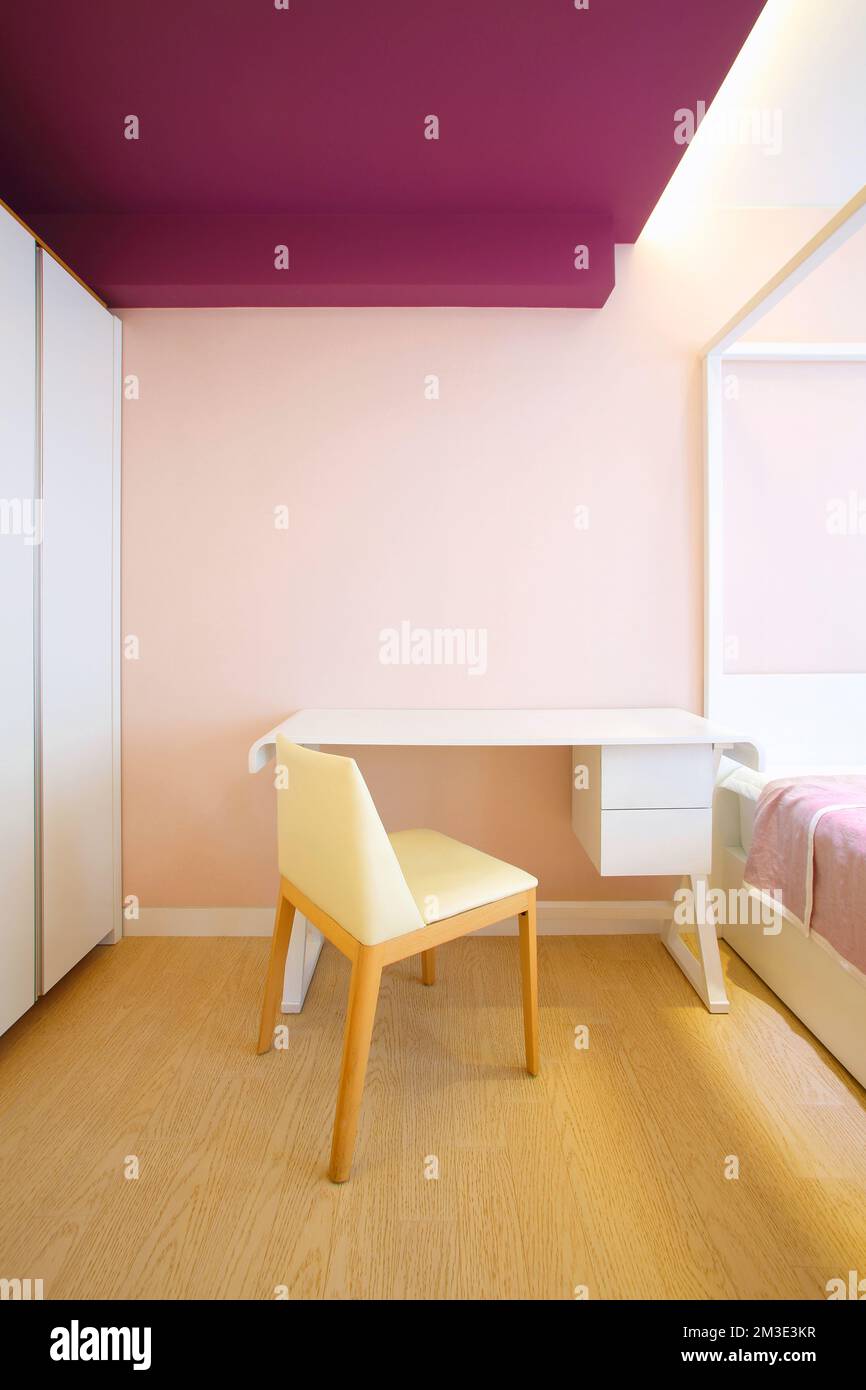 simple and clear interior with colorful wall and chair Stock Photo - Alamy